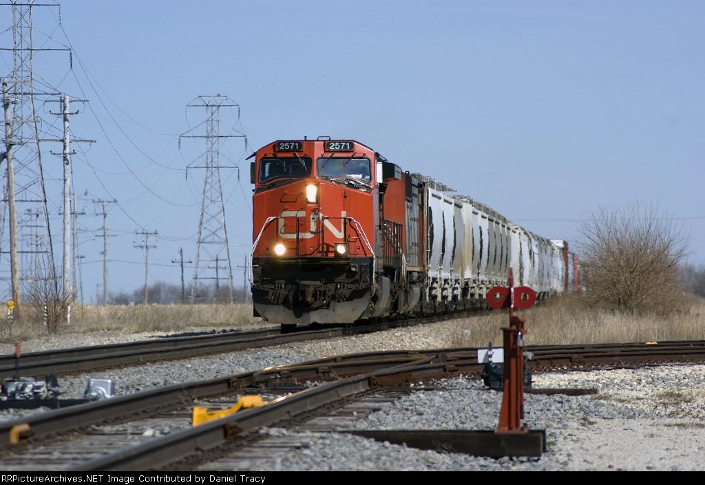 CN 2571 leads 343's train into Joliet at Cherry Hill Road